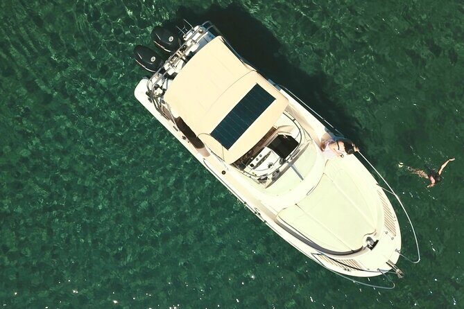 Explore Santorini and its volcanic wonders with Alex Private Boat - Authentic Experiences and Guest Insights