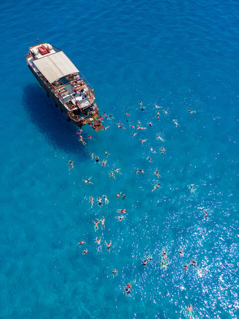 Faliraki : Transfer & Cruise to Lindos with 3 Swimming Stops - What the Tour Feels Like in Practice