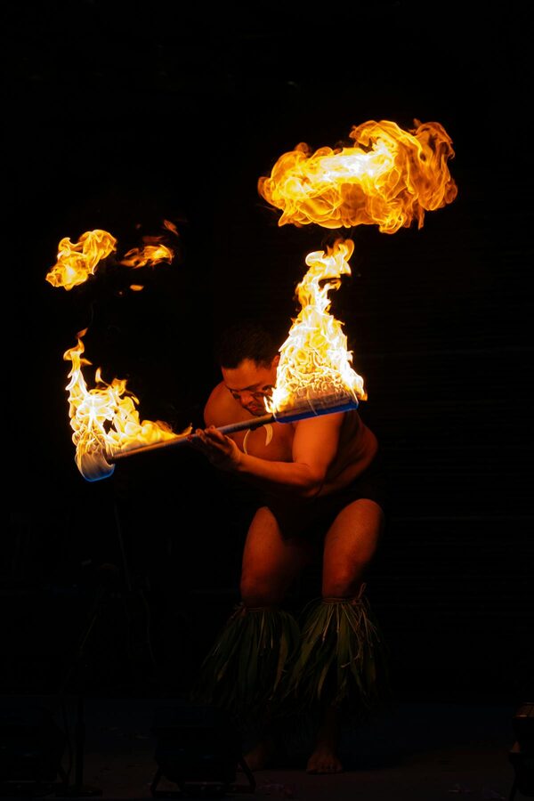 Stunning fire dance performance at night in Hawaii