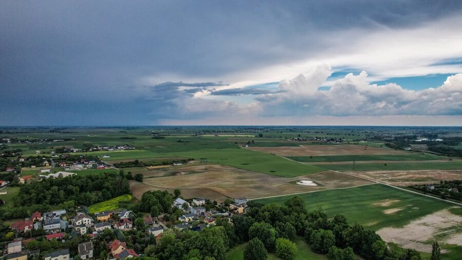 Aerial view of rural countryside with lush fields