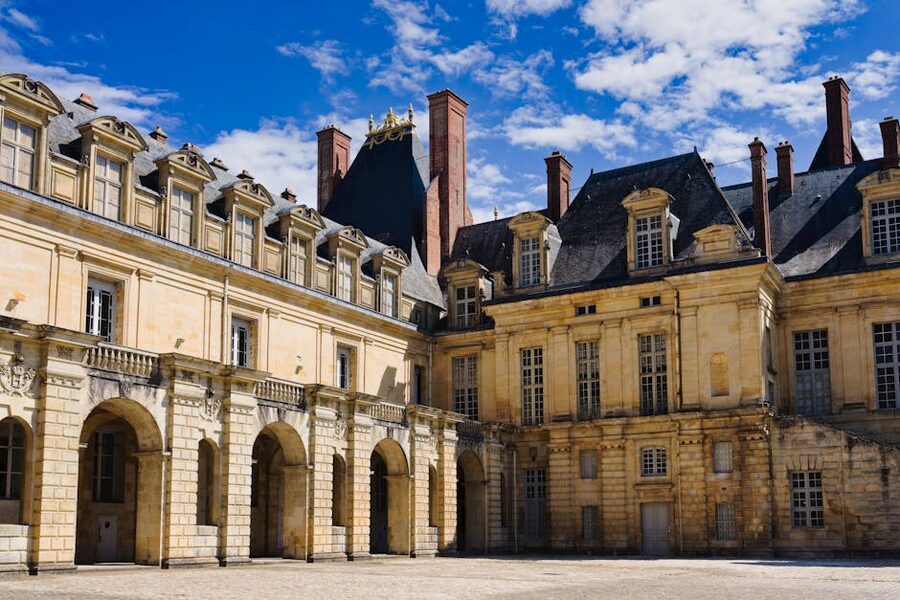 Château de Fontainebleau facade under blue sky
