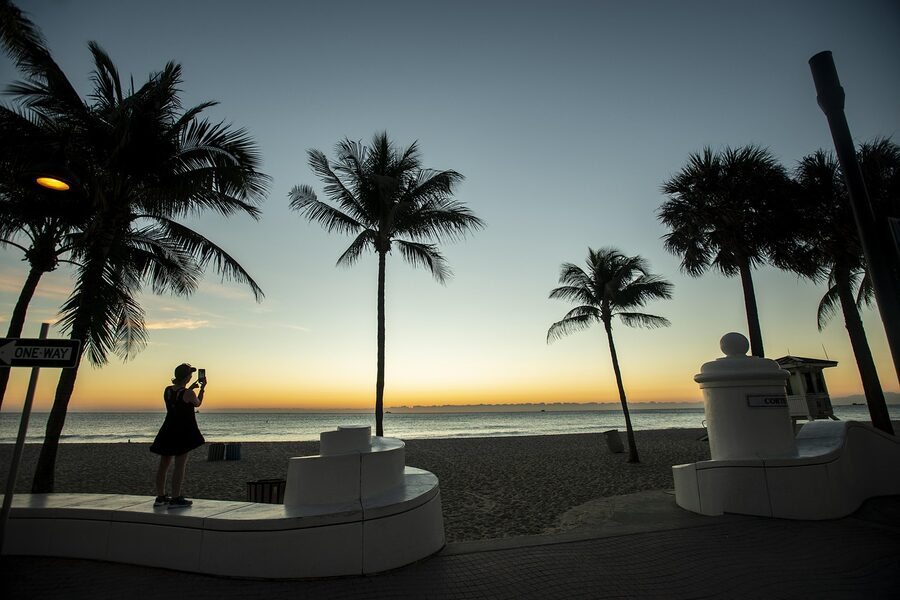 Fort Lauderdale beach sunset through palm trees