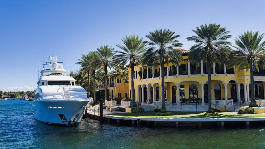 Luxury yacht moored beside a waterfront mansion on the Fort Lauderdale waterway