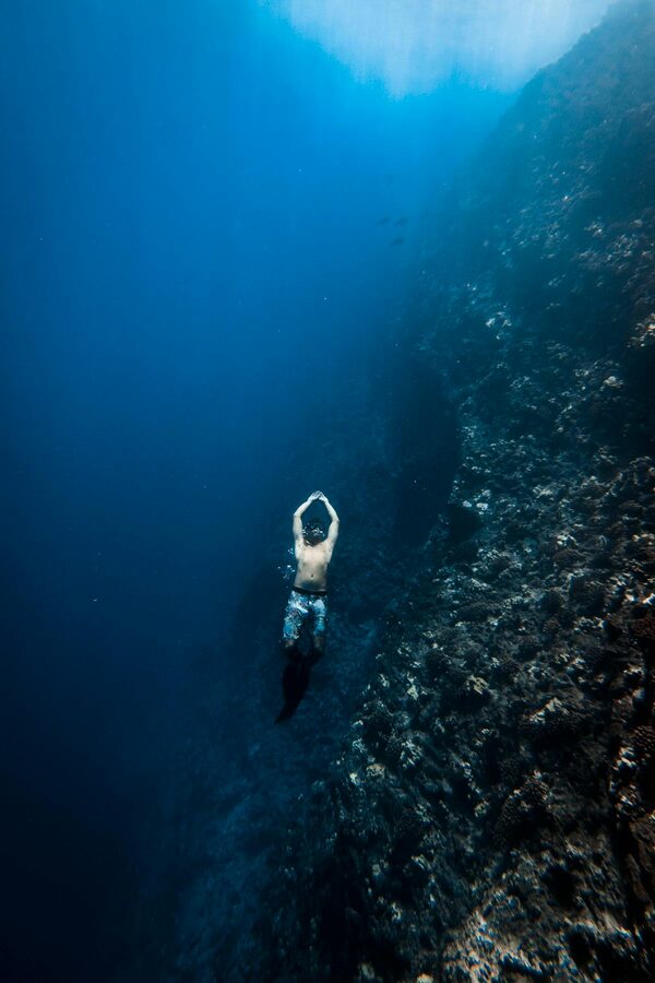 Free diver exploring coral reefs near Makena Maui
