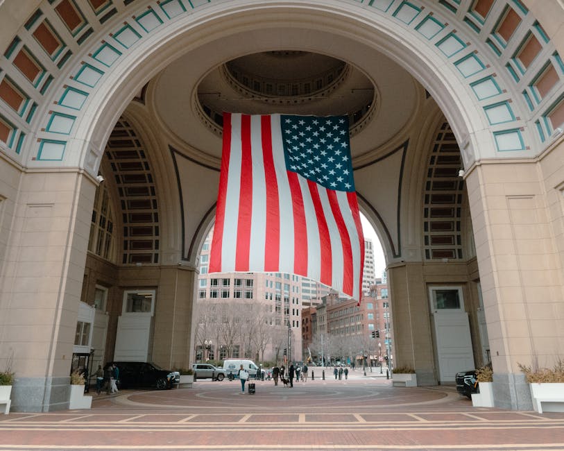 American flag hanging under a Boston archway on the Freedom Trail