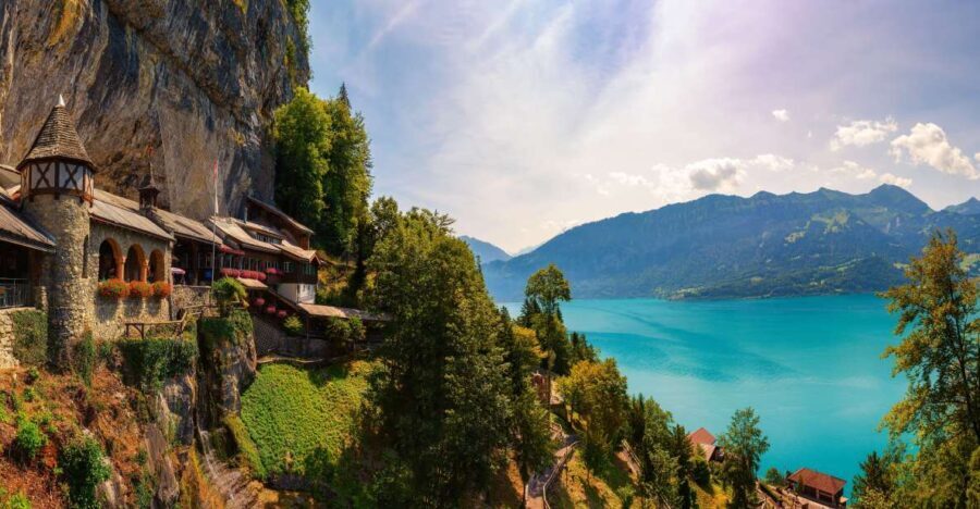 From Interlaken: Beatus Caves, Blue Lake and Lake Thun Tour - Crossing the Sigriswil Suspension Bridge