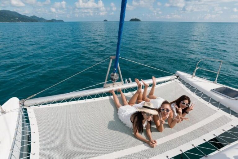 From Ornos: Mykonos Delos Catamaran Cruise with Meal & SUP - First Stop: The Charm of Delos