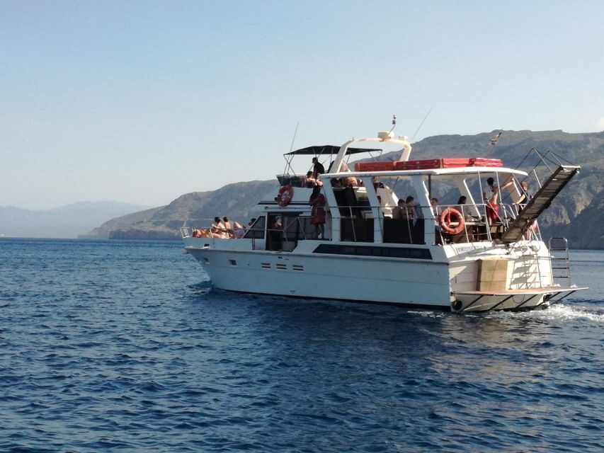 FULL DAY GROUP TOUR KOUTSOMITI KOUNOUPA & RED ROCK WITH MEAL - The Boat and Comforts on Board