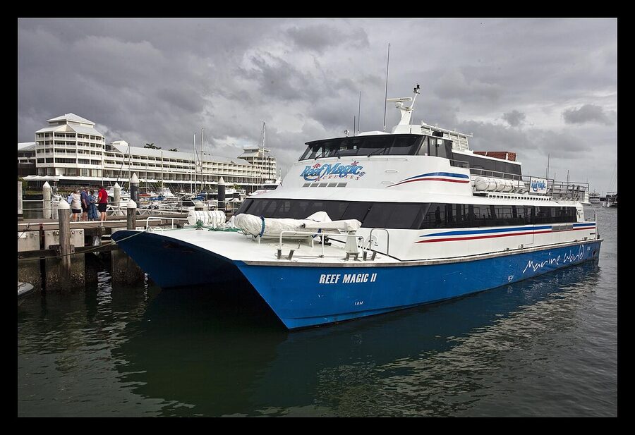 Reef Magic catamaran moored at Cairns Marina ready for Great Barrier Reef cruise