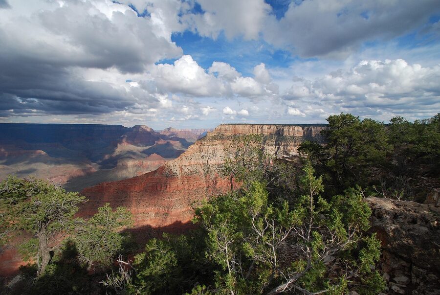 Grand Canyon South Rim vista under dramatic stormy skies