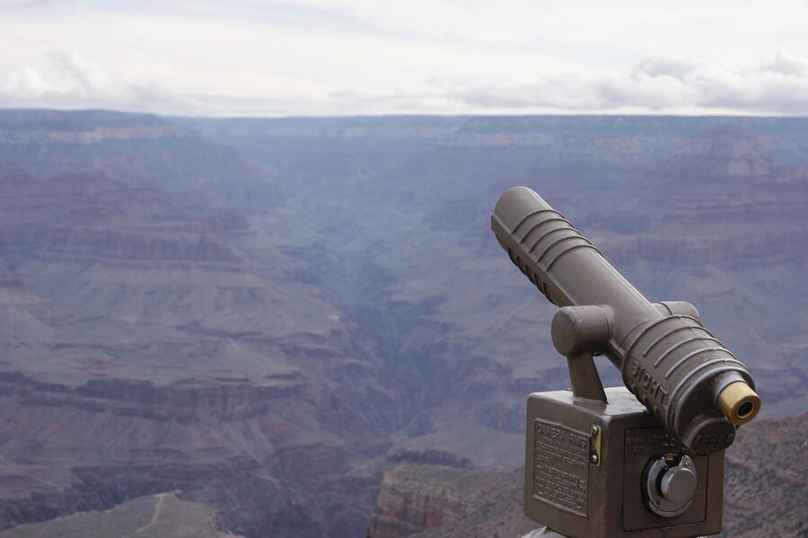 Tourist telescope viewpoint overlooking Grand Canyon