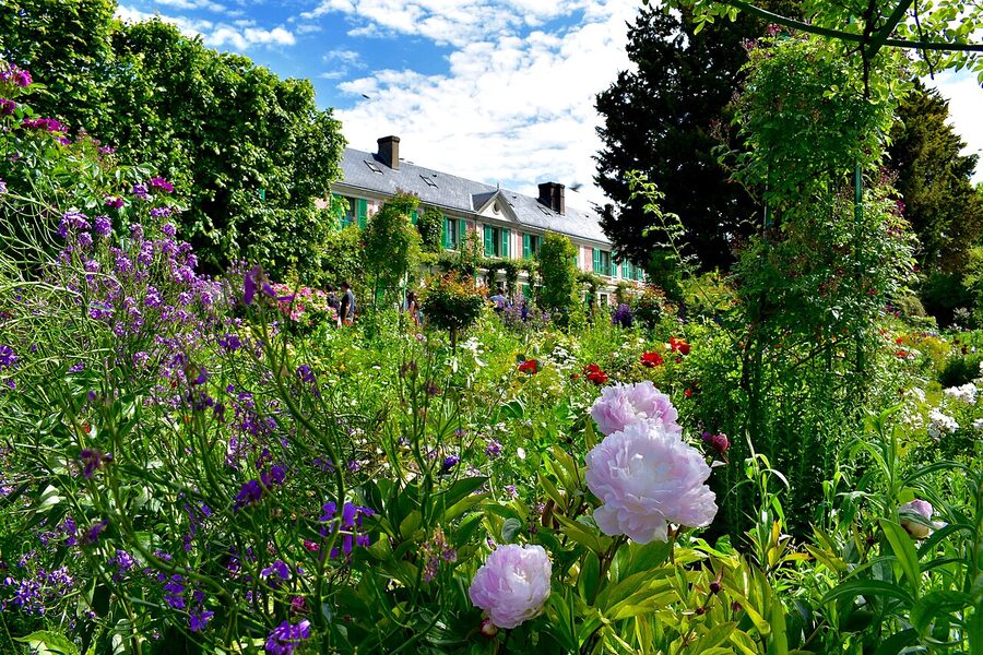 Claude Monet's pink and green house behind the Clos Normand garden Giverny