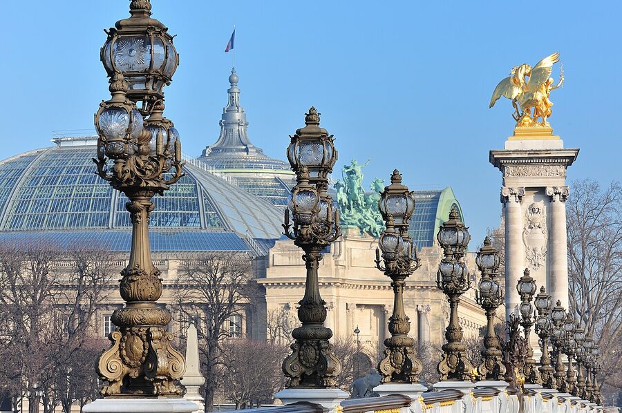 Grand Palais Paris seen across Pont Alexandre III with golden quadrigas