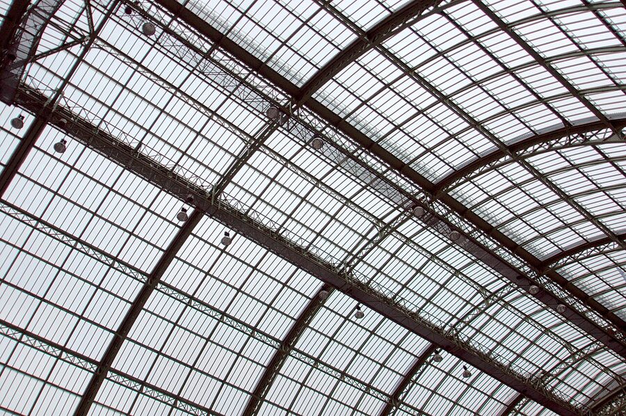 Sculpted figure on the roof of the Grand Palais Paris in late evening light
