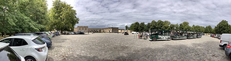 The pink marble front facade of the Grand Trianon at Versailles