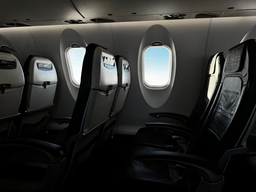 Inside a small aircraft cabin with view of sky