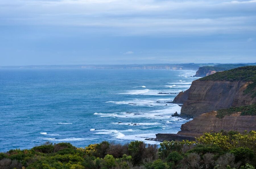 Rugged cliffs and ocean waves along the Great Ocean Road