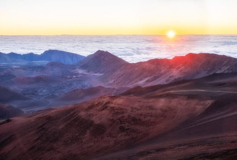 Stunning sunrise view over Haleakala Crater with volcanic landscape