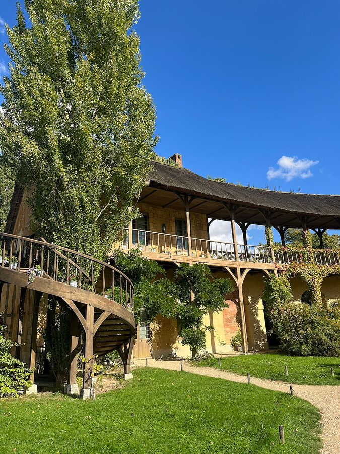 The Hameau de la Reine pond at Versailles, with the mill and Marlborough Tower