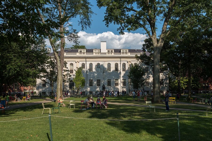 Harvard Yard in summer with entrance gate and grass quad