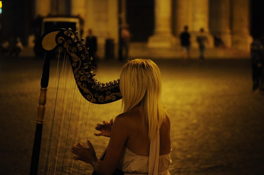Harpist performing on stage
