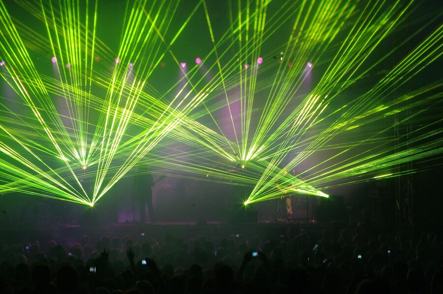 Green laser beams during a concert light show