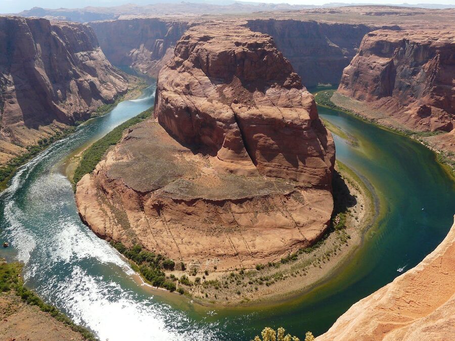 Iconic Horseshoe Bend meander with Colorado River cutting through Arizona rock