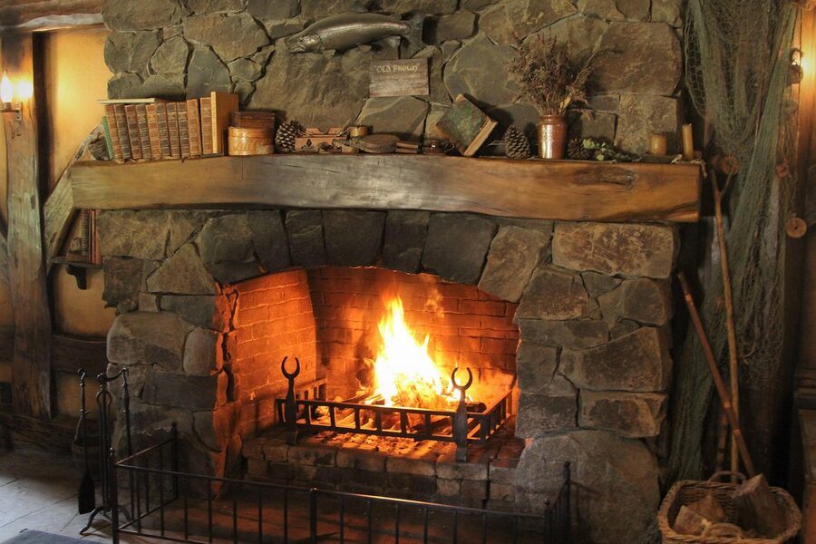 Hobbiton hobbit house cozy fireplace interior
