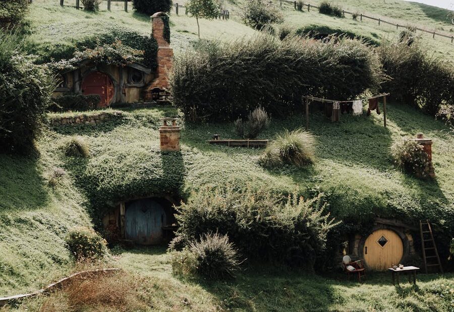 Hobbiton-style hobbit houses on green hills