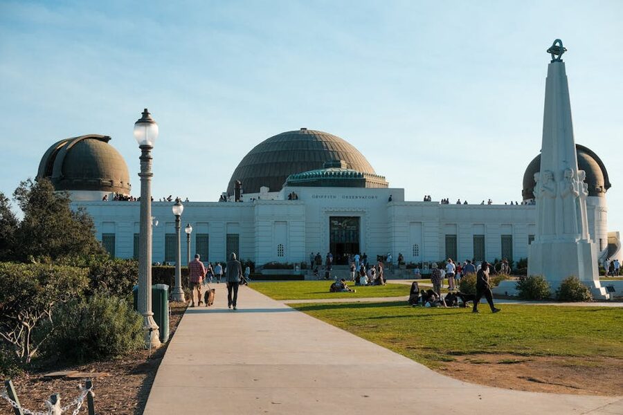Griffith Observatory front terrace with visitors on a sunny day