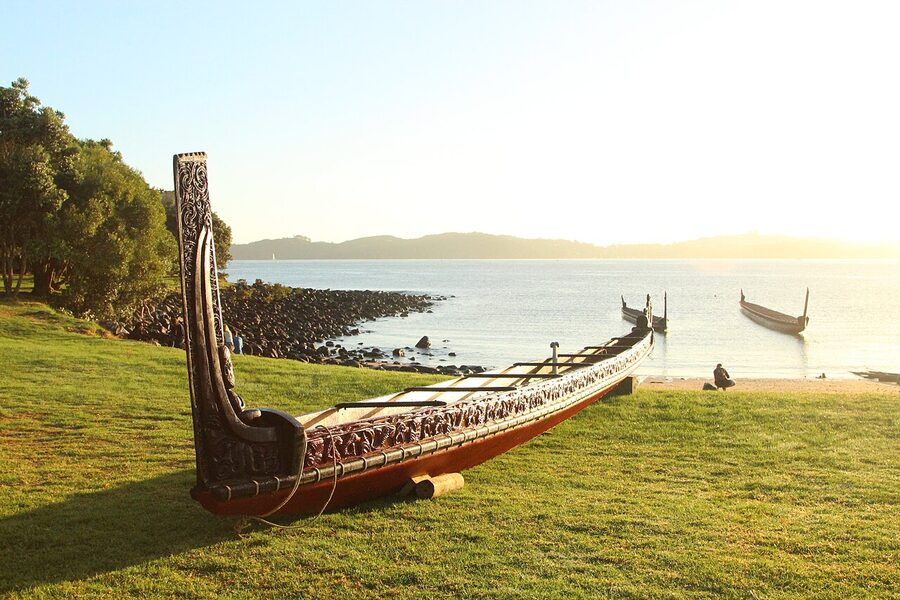 Maori waka war canoe on water in New Zealand