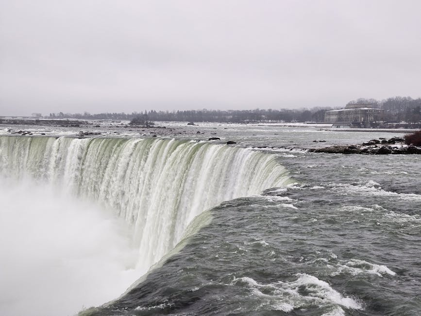 Horseshoe Falls in winter with ice around the edges
