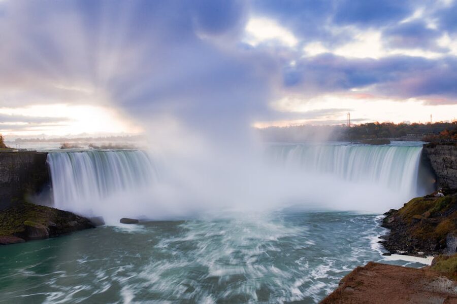 Niagara Falls with autumn foliage at sunrise