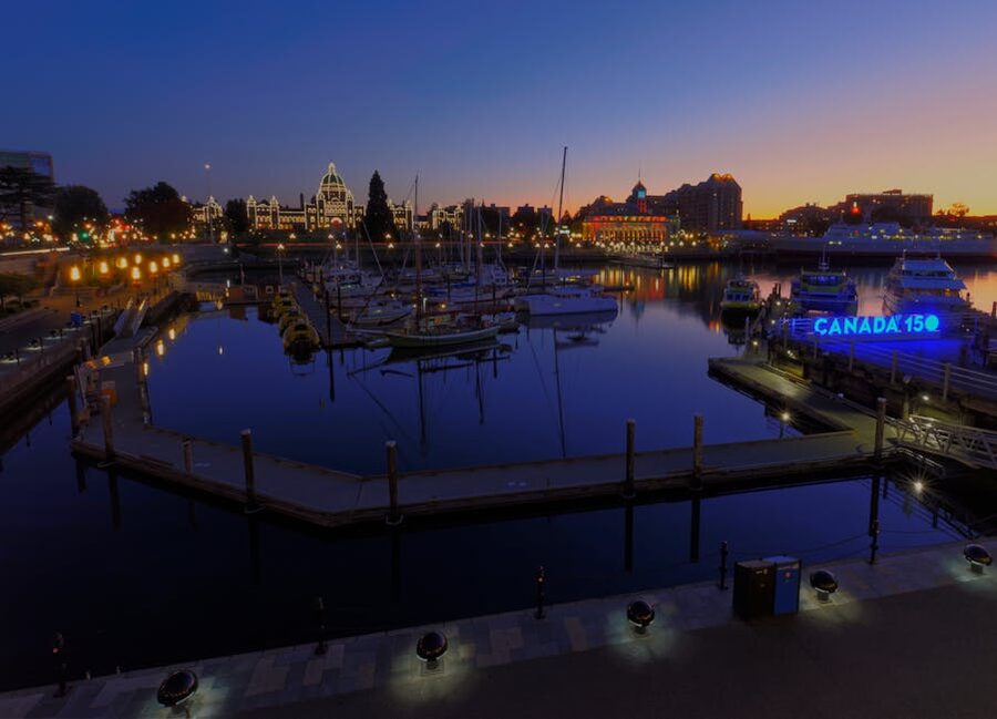 Victoria Harbor illuminated at dusk