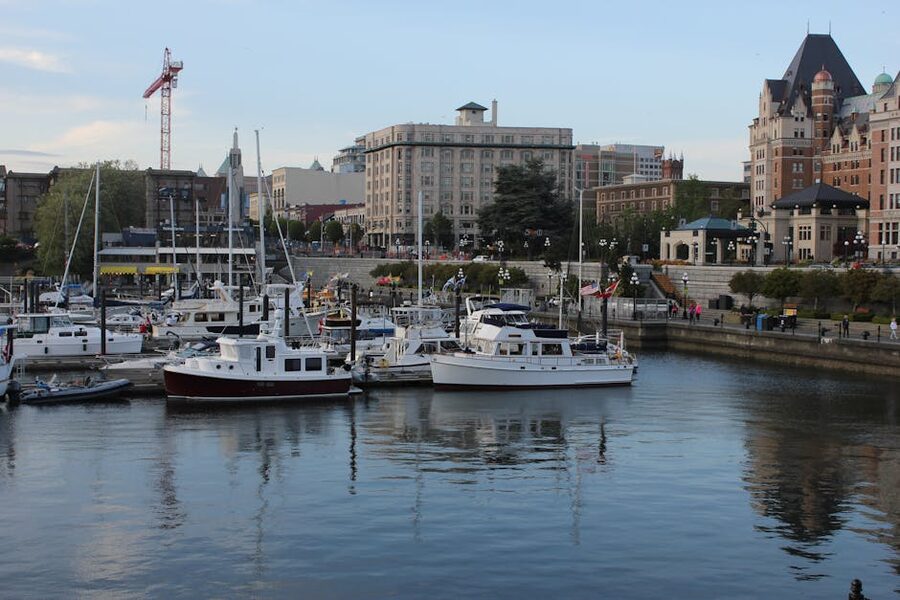 Yachts moored Victoria Inner Harbour historic architecture