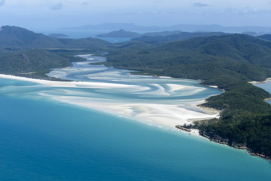 Aerial view of Whitsunday Island and surrounding waters from above