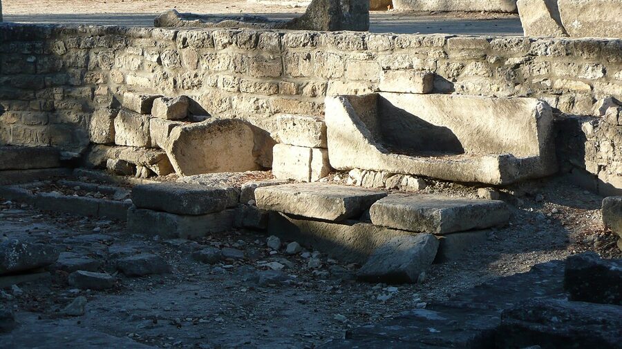 Alyscamps Roman necropolis avenue of stone sarcophagi Arles