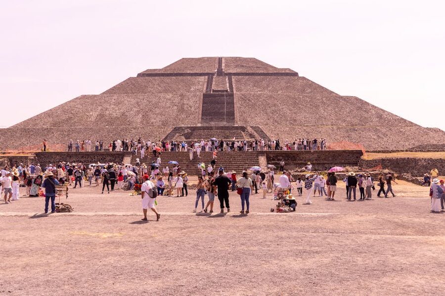 Visitors at the base of the Pyramid of the Sun at Teotihuacan