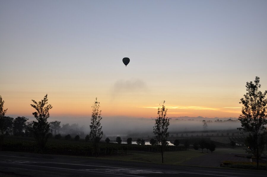 Hot air balloon over the Hunter Valley at sunrise