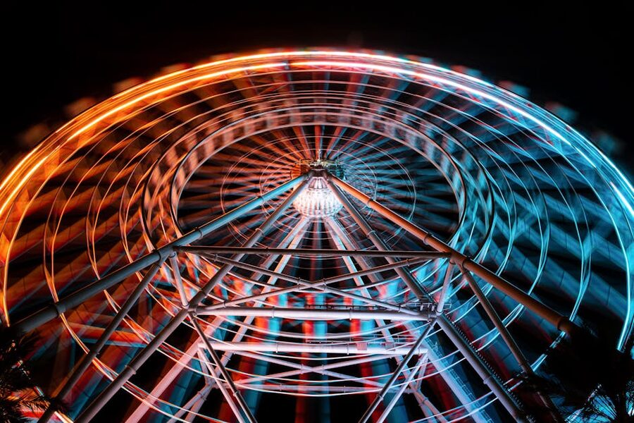 ICON Park Ferris wheel lit up at night in Orlando