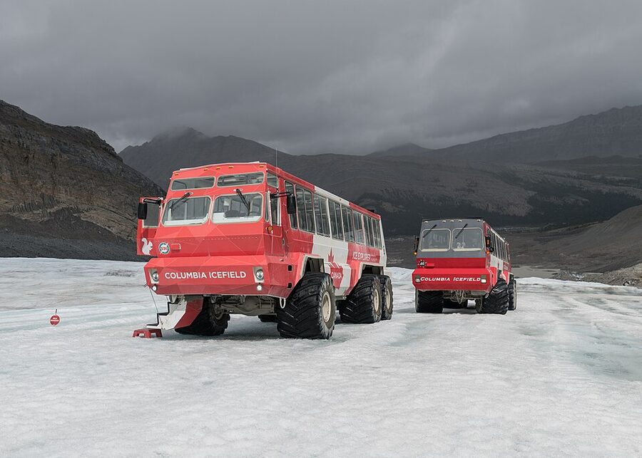 Pursuit Ice Explorer vehicles parked on the Athabasca Glacier