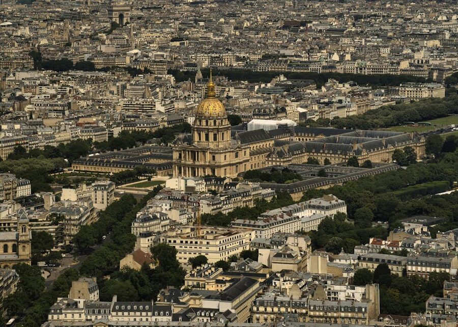 Aerial view of Les Invalides golden dome over Paris