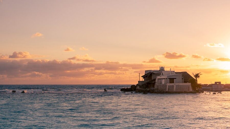 Sunset over a seafront villa on Isla Mujeres