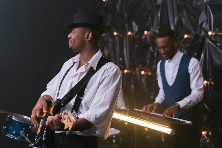 Jazz musicians performing with guitar and piano at a live show