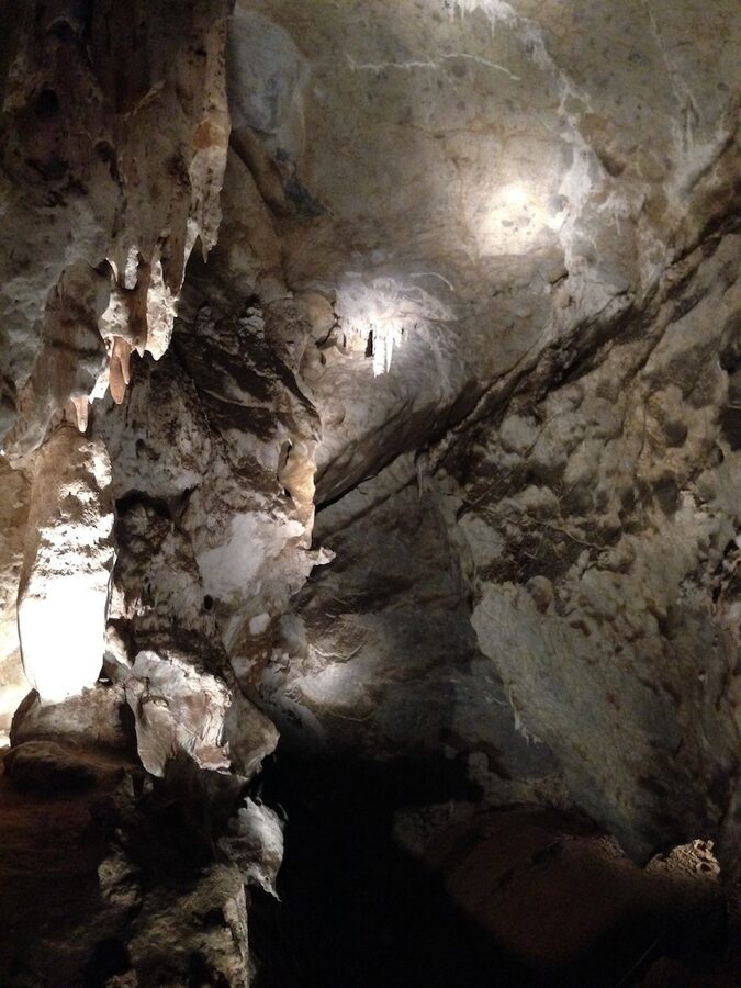Grand Arch from within at Jenolan Caves looking out at the karst valley