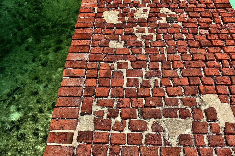 Red brick oceanfront pathway along the Gulf of Mexico in Key West, Florida