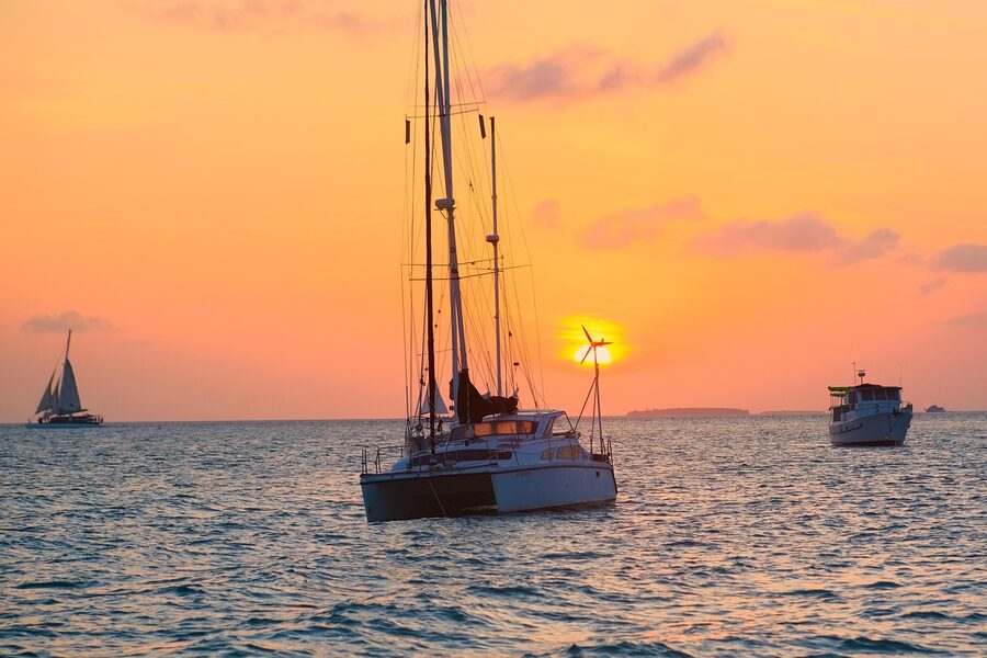 Key West waterfront at sunset with boats