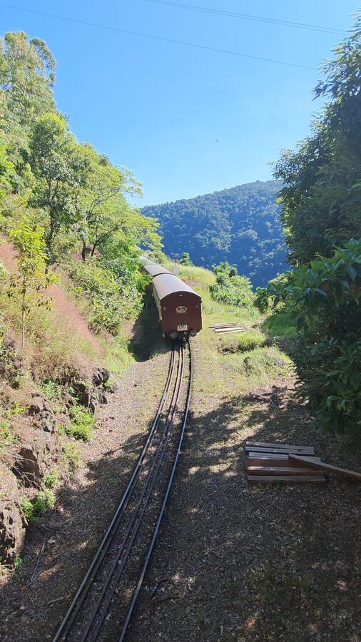 Kuranda Scenic Railway train crossing Rocky Lookout bridge