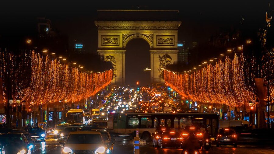 Arc de Triomphe and Champs-Elysees with night traffic