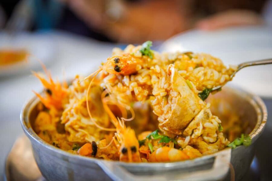 Lisbon Hidden Gems Walk: Traditions, Lunch & Ferry Ride - Exploring the Historic Heart: Rossio and Baixa